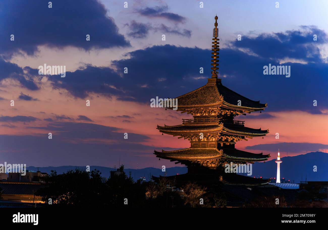 Sunset over traditional and modern landmark towers in Kyoto Stock Photo ...