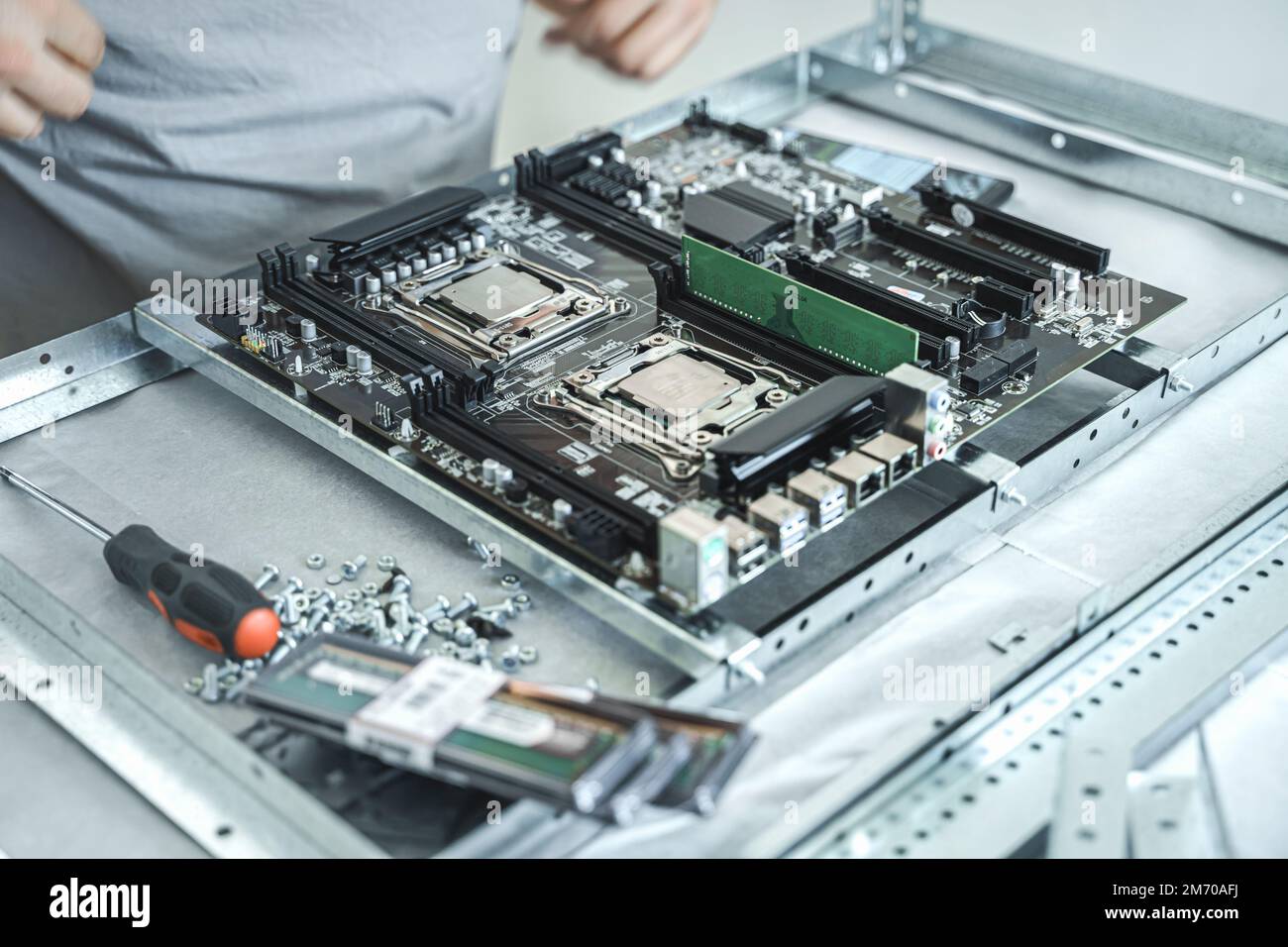 Man engineer,collector.Independent self computer assembly. Mounting socket processor,random ...