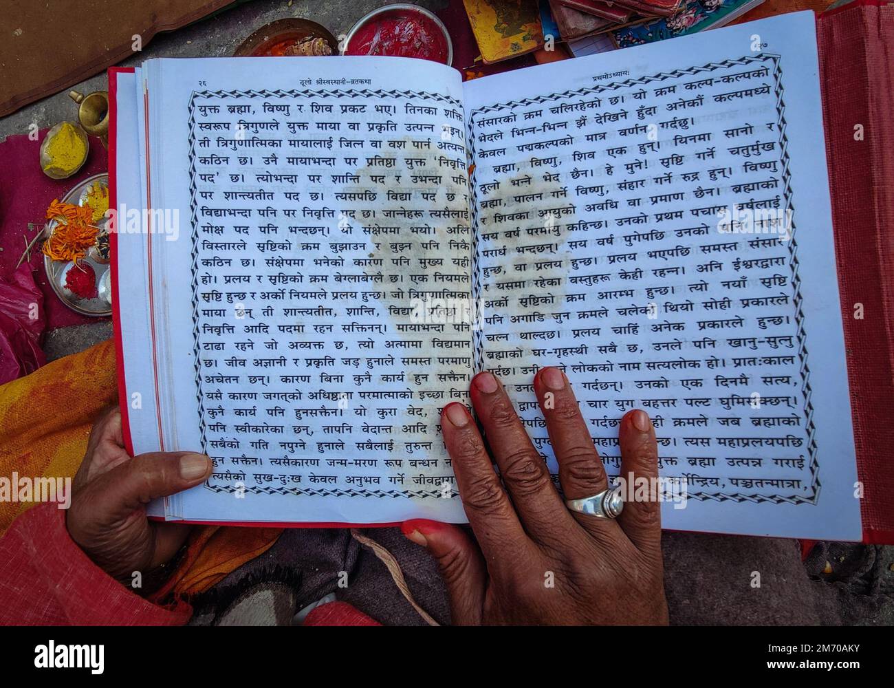 Kathmandu, Bagmati, Nepal. 6th Jan, 2023. A priest reads the chapter of ...