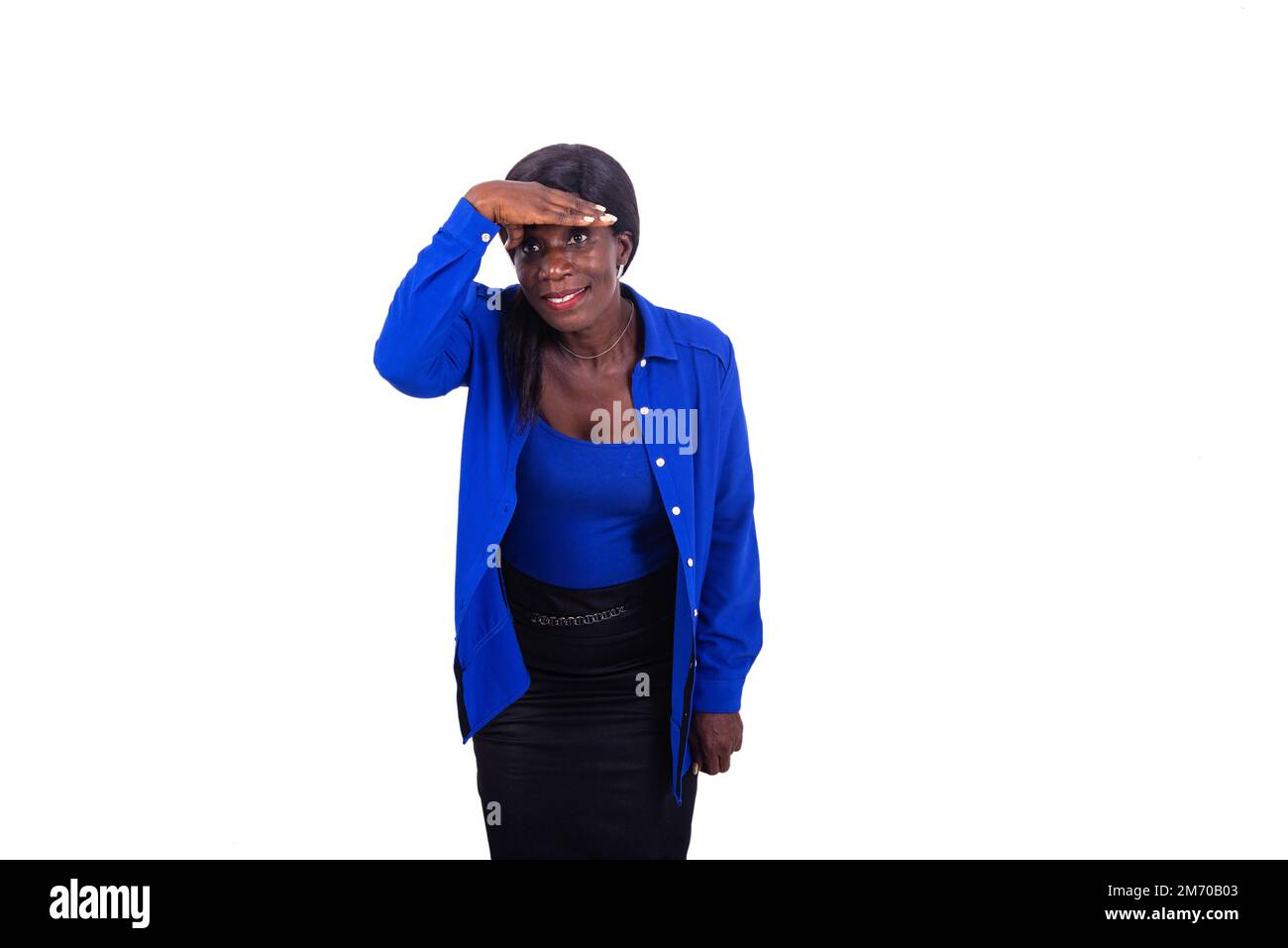 portrait of a beautiful mature business woman looking away with hand on ...