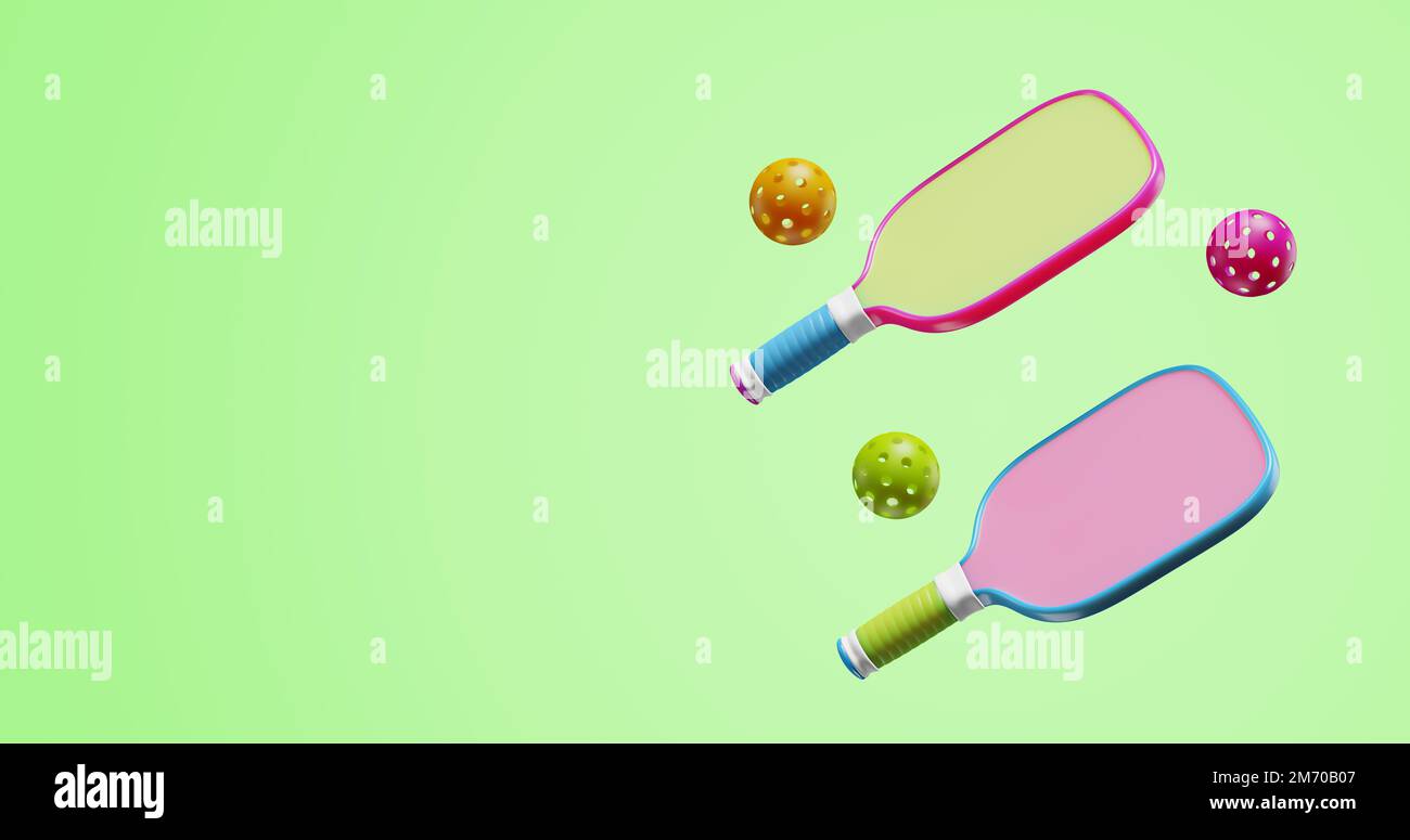 Two multi-colored pickleball rackets with balls on a green background ...