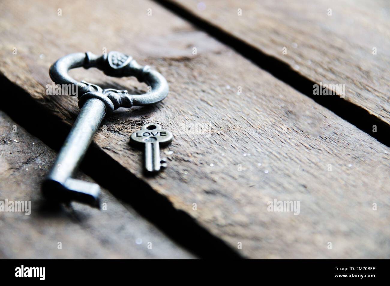 Love key idea. Key with the heart as a symbol of love Stock Photo - Alamy