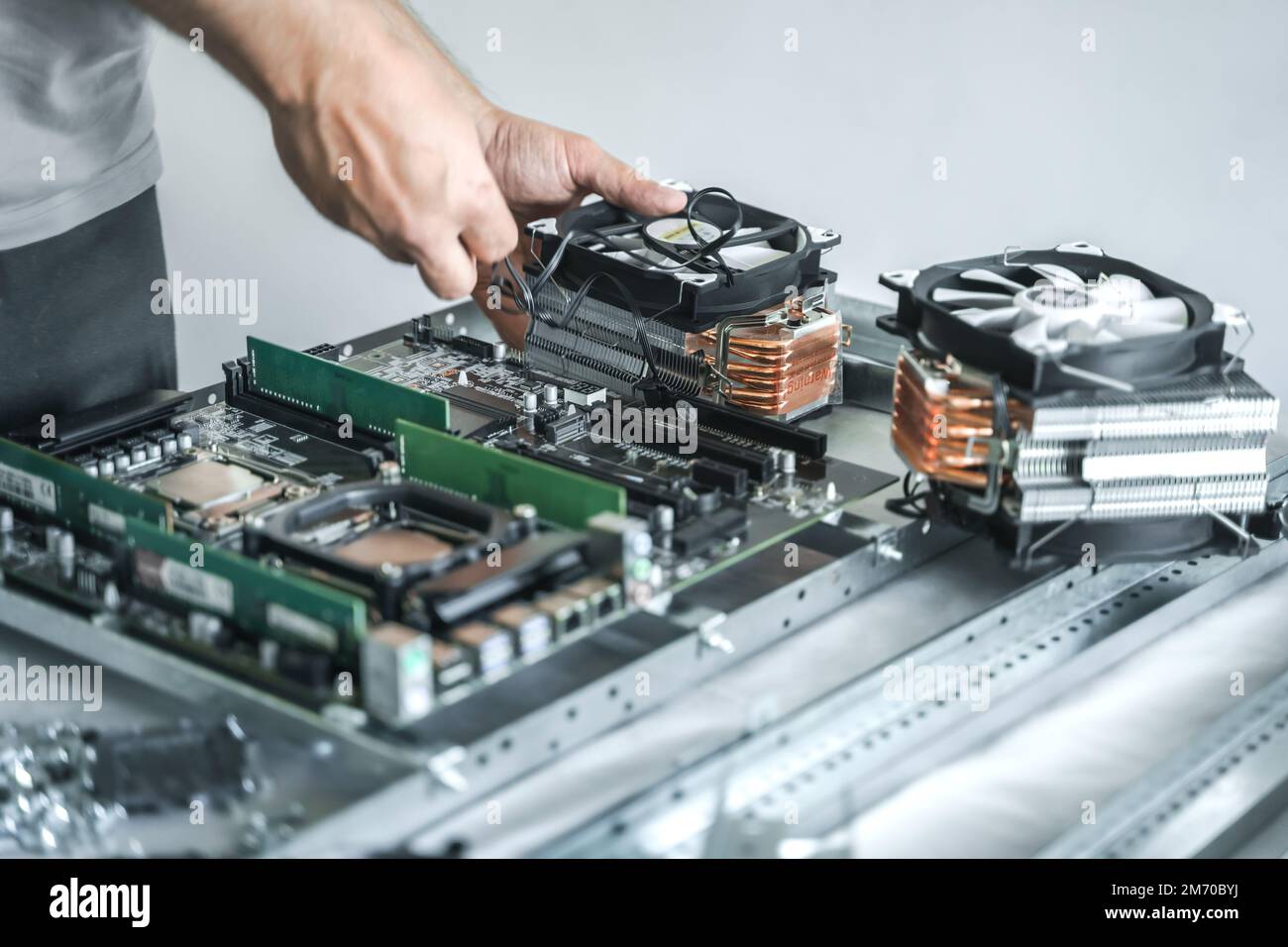 Man engineer,collector.Independent self computer assembly. Mounting socket processor,random ...