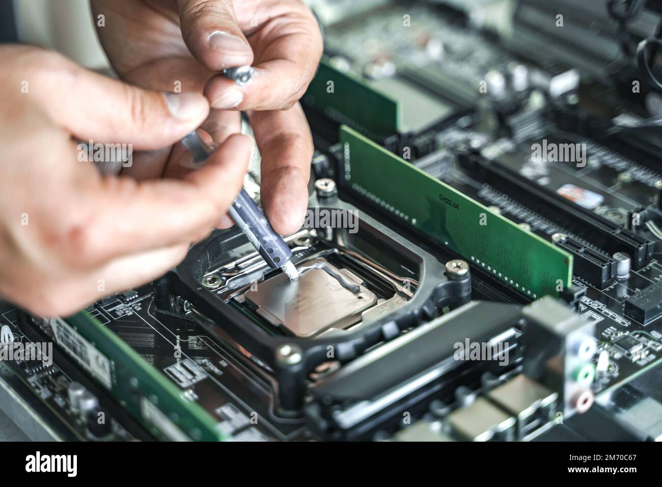 Man engineer,collector.Independent self computer assembly. Mounting socket processor,random ...