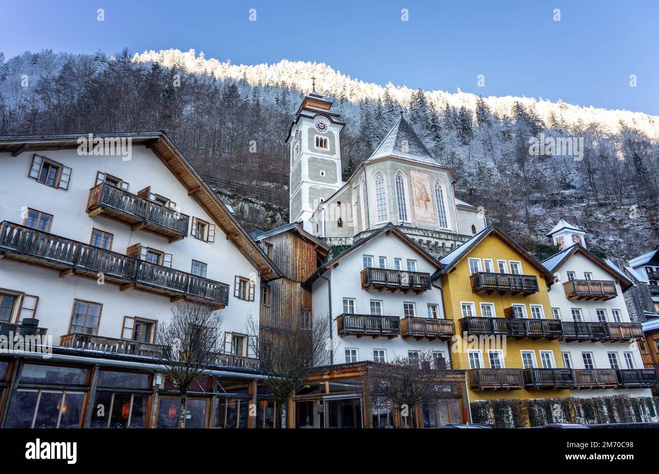 beautiful buildings and church of the special city Hallstatt in Austria ...