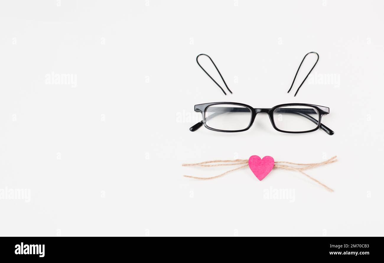 Easter bunny face with a heart shaped nose, eyeglasses and whiskers ...