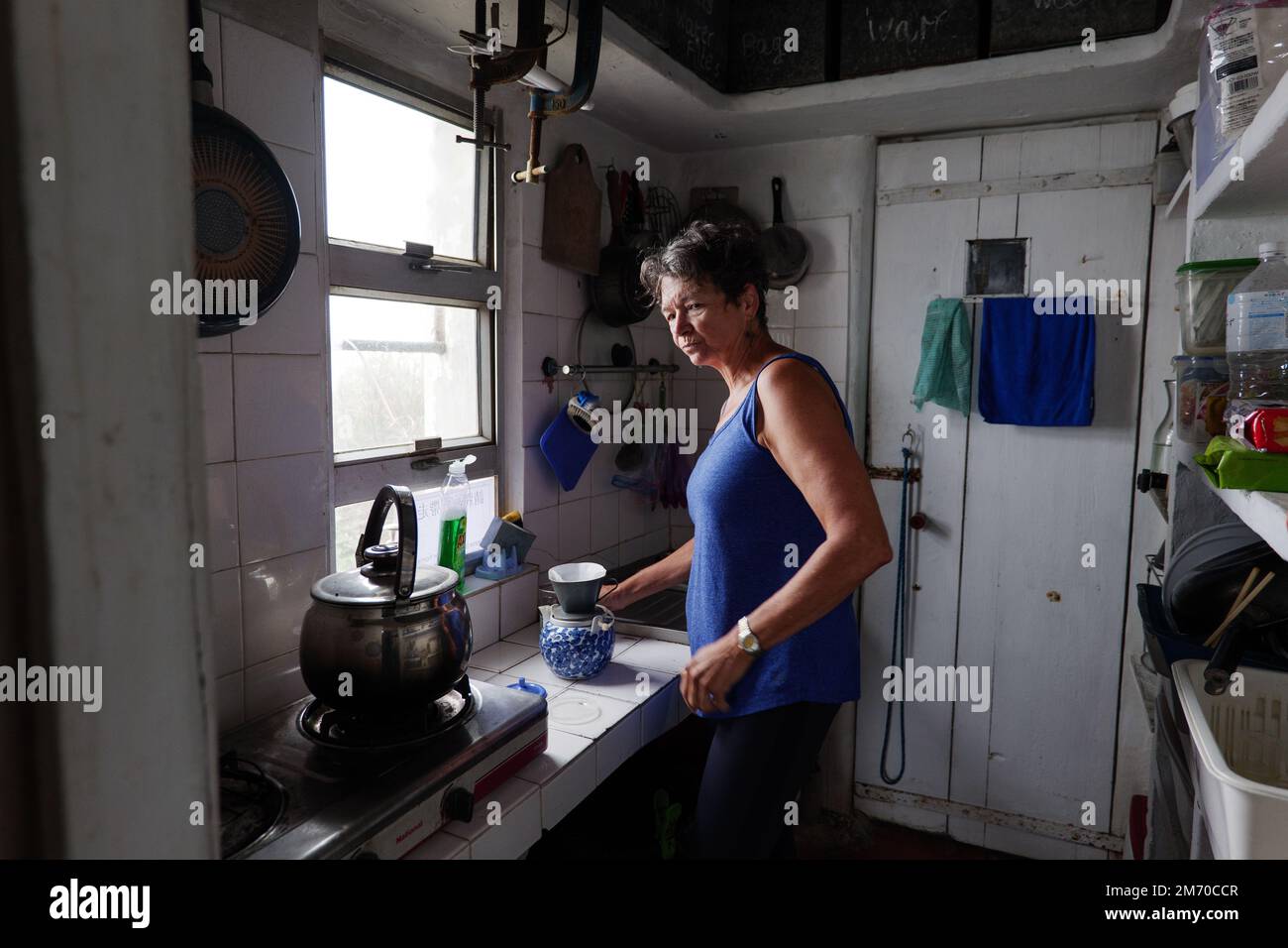Martha Collard, stone cabin owner at Lantau Mountain Camp on Sunset ...