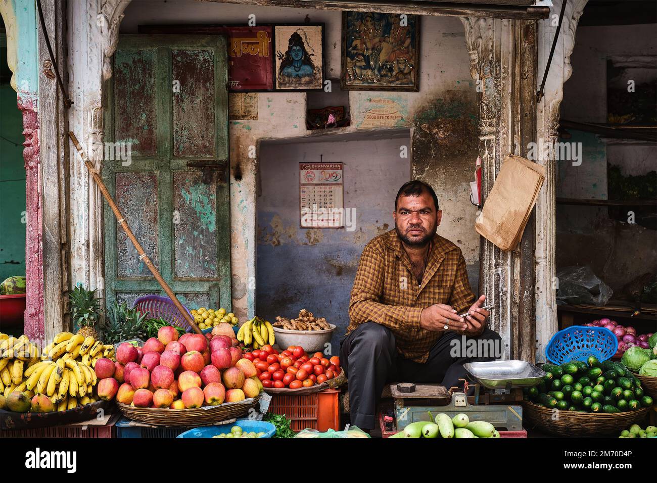 Pushkar, India - November 7, 2019: Vegetable fruit street shop vendor selling vegetables and ...