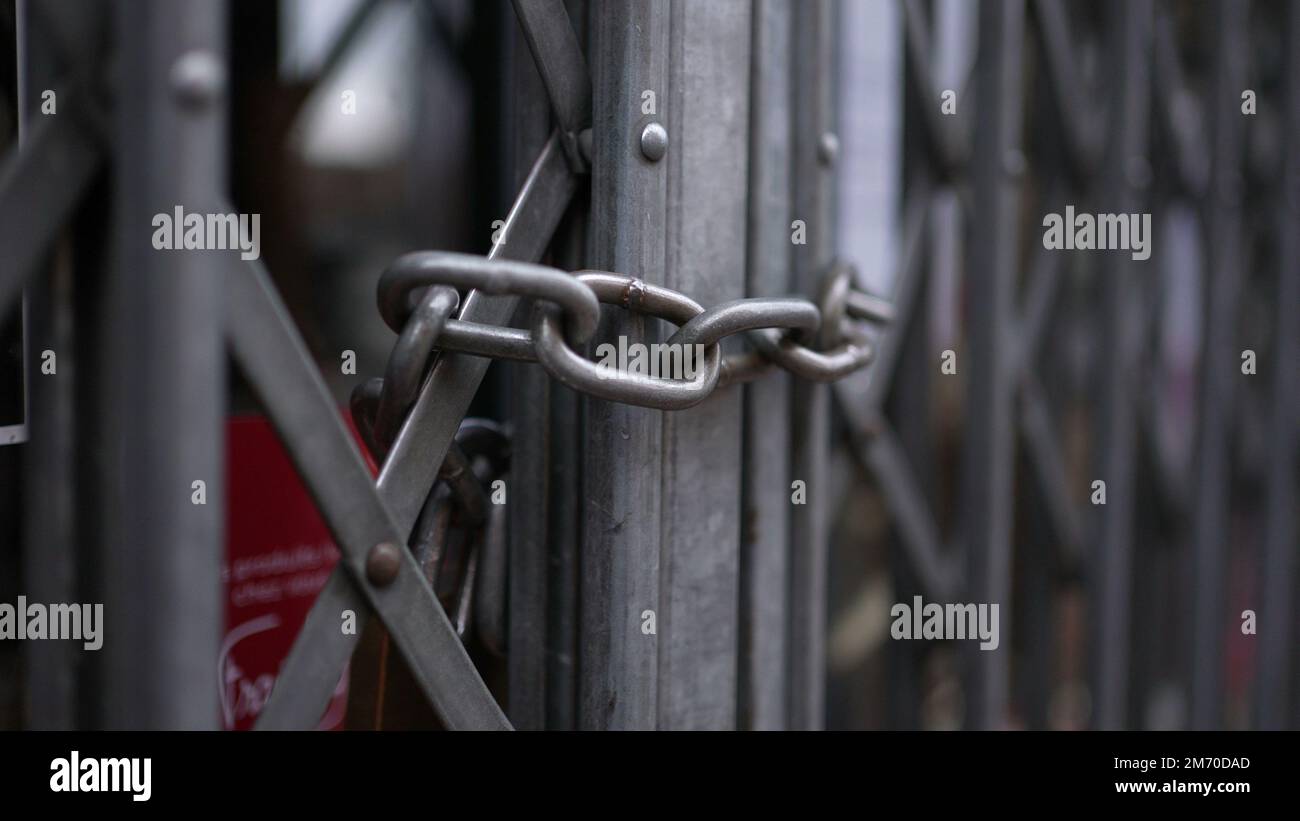 Store front locked with LOCK Stock Photo - Alamy
