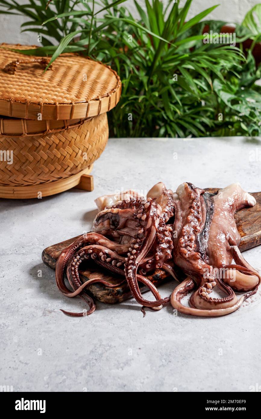 steamed octopus in a bamboo steamer, Asian style Stock Photo - Alamy