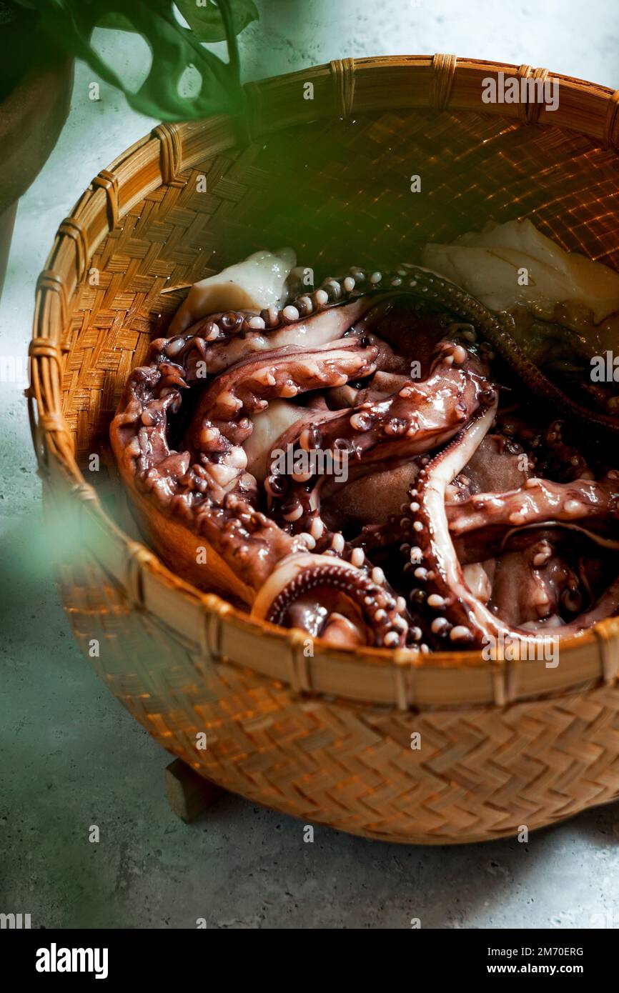 steamed octopus in a bamboo steamer, Asian style Stock Photo - Alamy