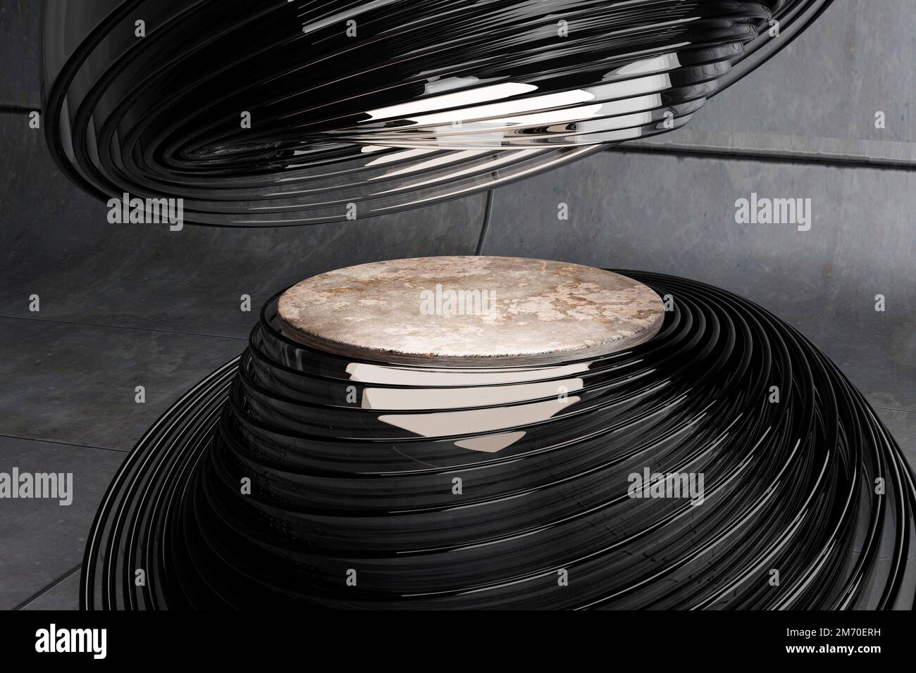 An image of two shiny black iron round objects with layers and a light ...