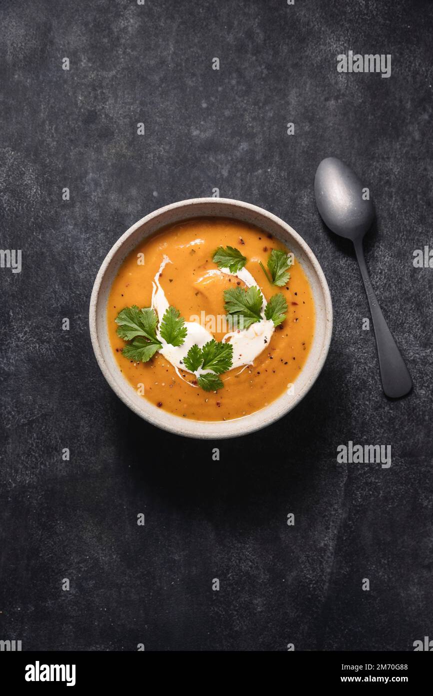 Butternut squash soup with spoon Stock Photo - Alamy