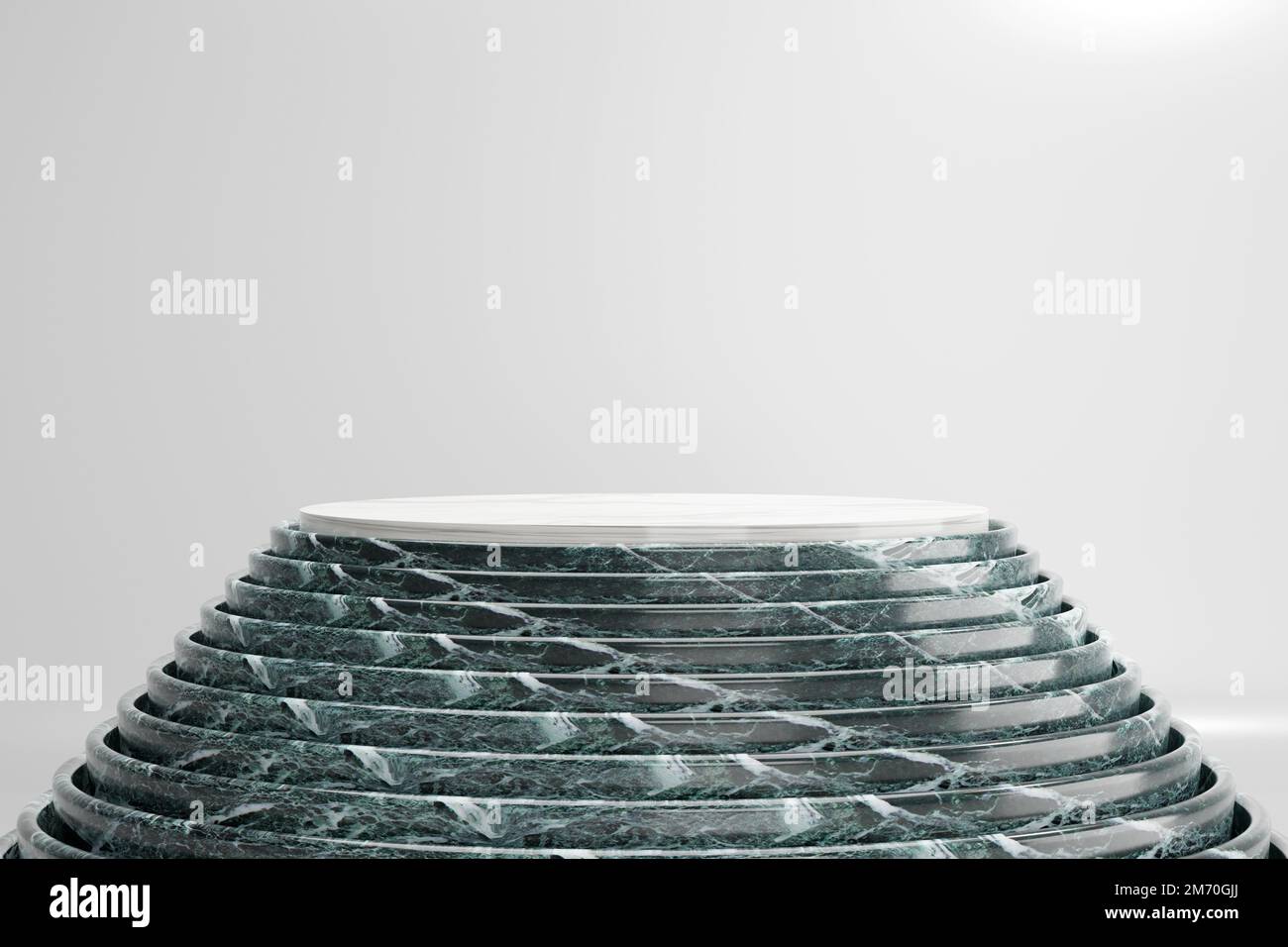 An image of a shiny green round table with layers and a white center on ...