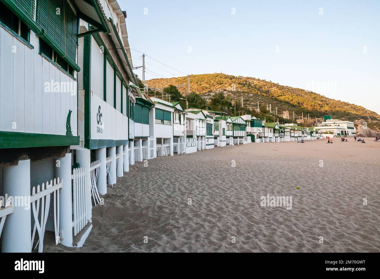 people at the beach, Les Casetes del Garraf, distinctive small green ...