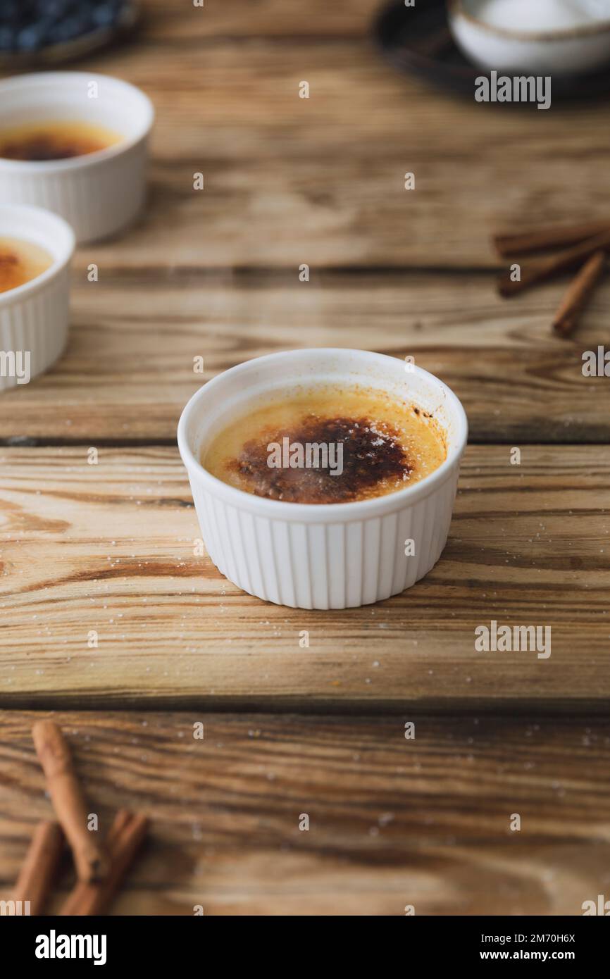 Crema Catalana Spanish Custard on a wooden kitchen top Stock Photo - Alamy