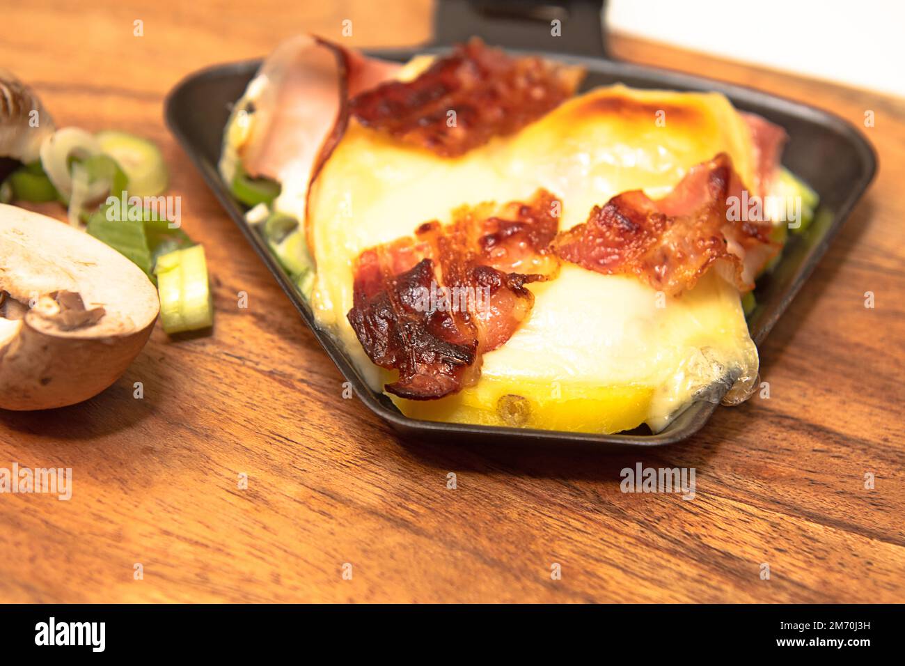 Swiss traditional raclette hi-res stock photography and images - Alamy