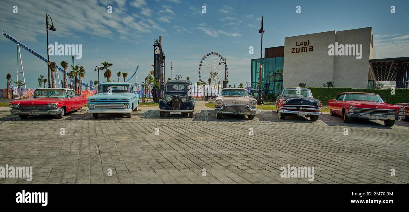Classic cars on display in Lusail Winter Wonderland outdoor amusement ...