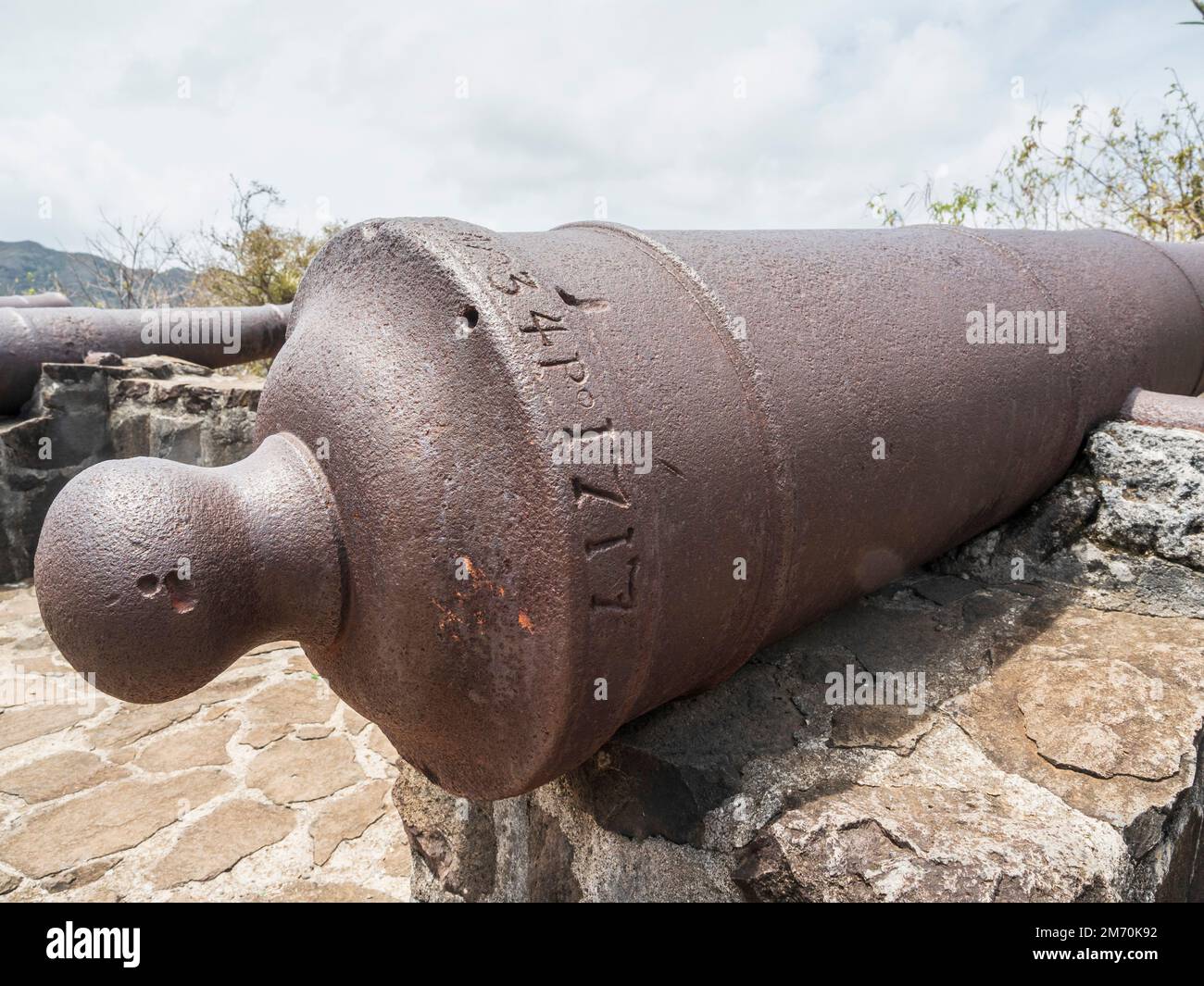 Bequia, Admiralty Bay, Hamilton. Village with old cannon emplacement ...