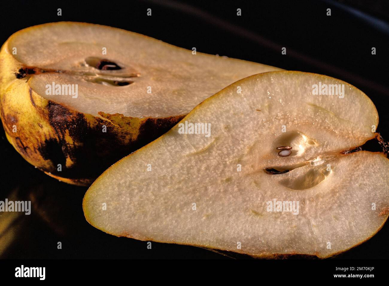 Pear cut in half hi-res stock photography and images - Alamy