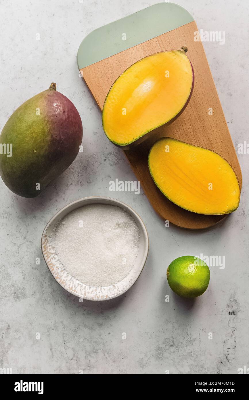 Ingredients to make Mango Compote Stock Photo - Alamy