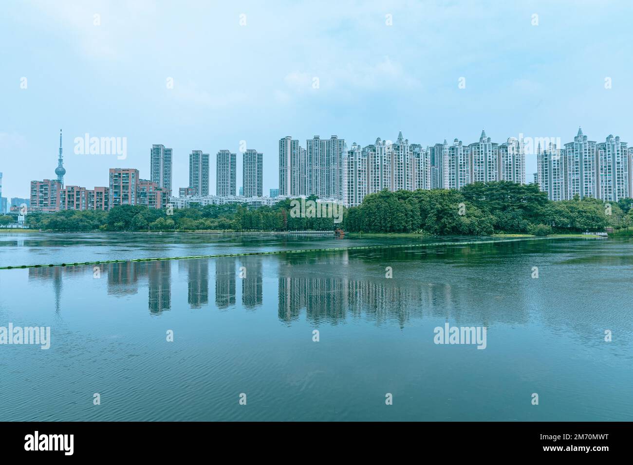 A low-angle of high-rise buildings in Fuzhou with a lake view, Fujian ...
