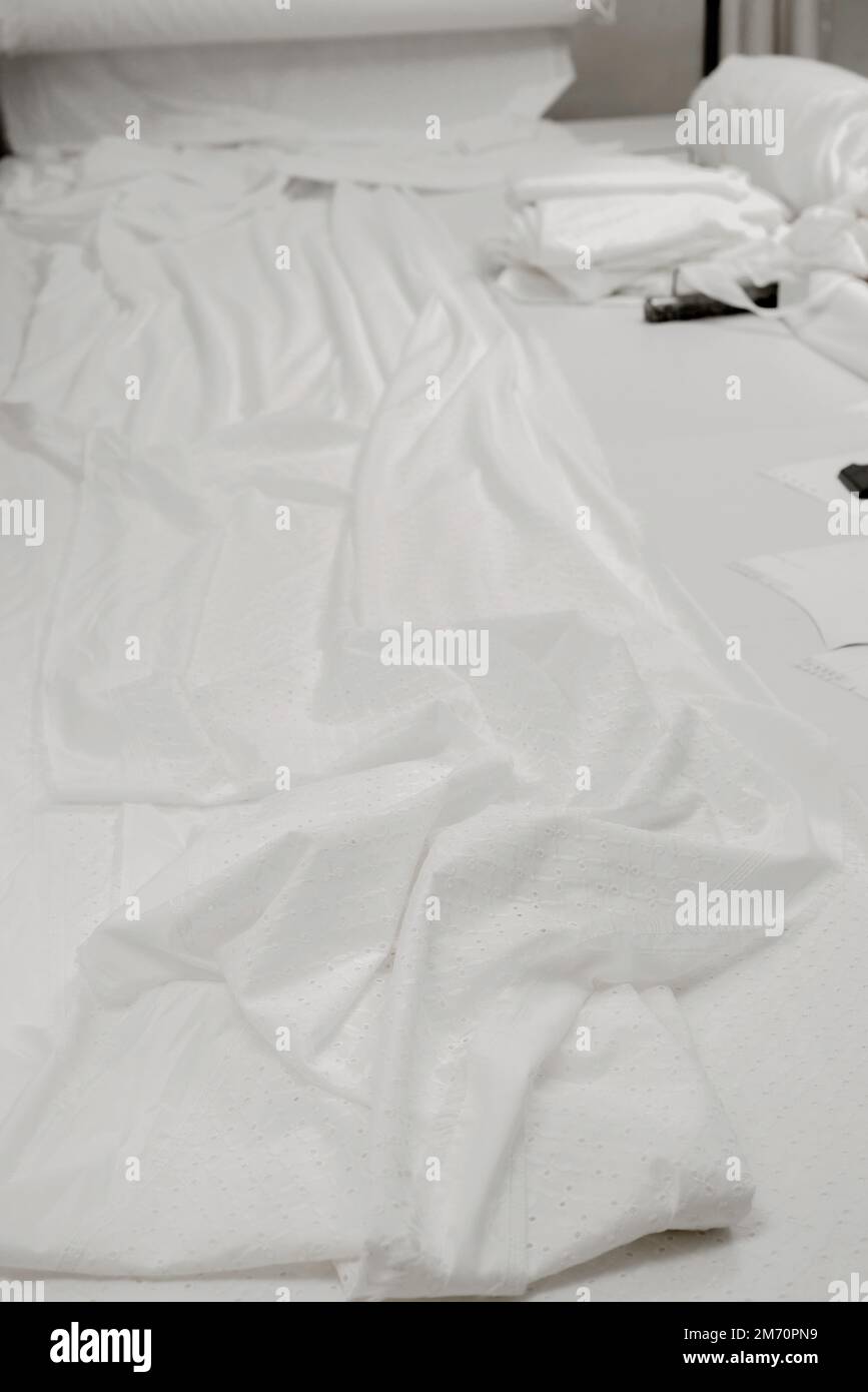 production of women's summer clothes; manufacturing process at a light ...