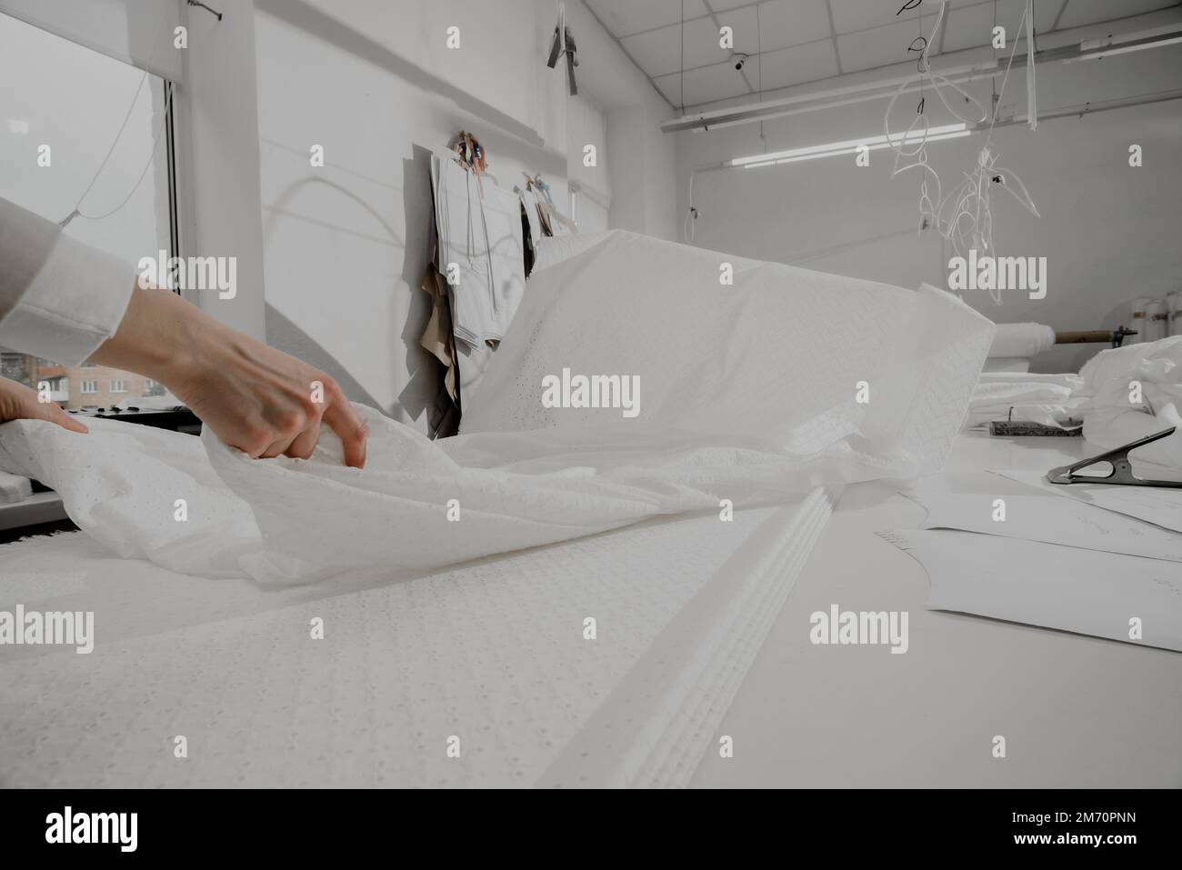 production of women's summer clothes; manufacturing process at a light ...