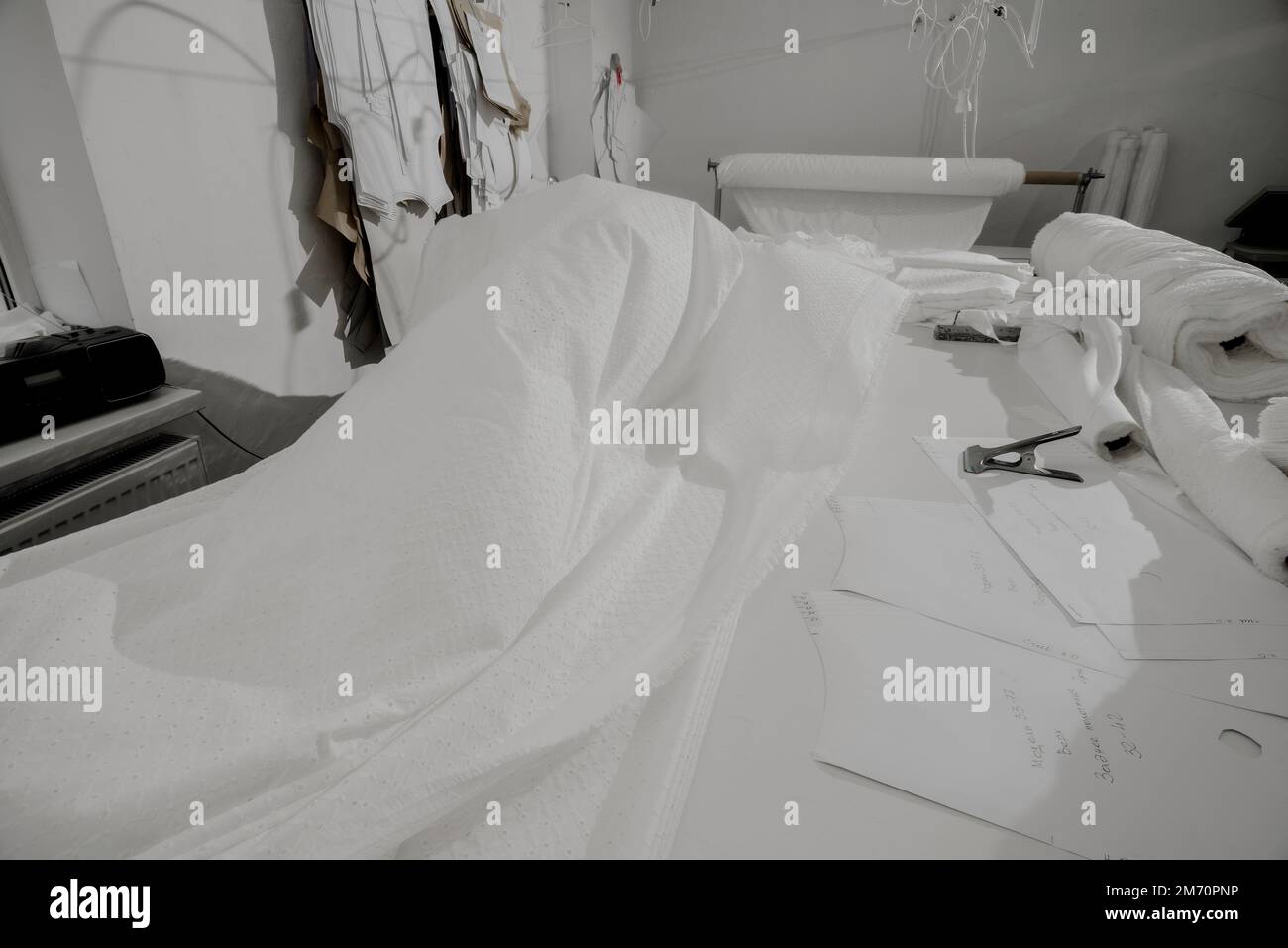 production of women's summer clothes; manufacturing process at a light ...