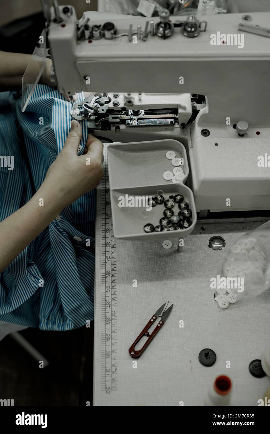 production of women's summer clothes; manufacturing process at a light ...