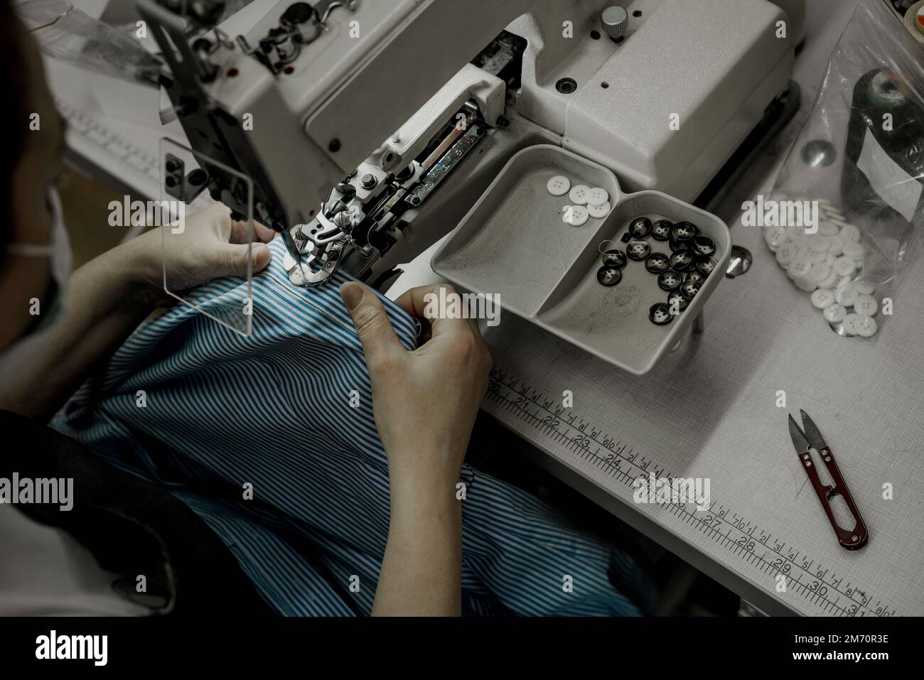 production of women's summer clothes; manufacturing process at a light ...