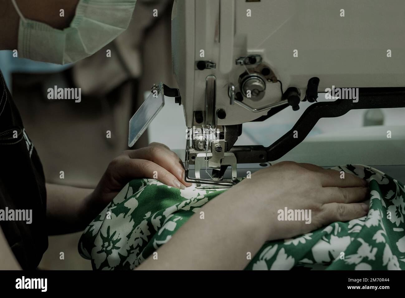 production of women's summer clothes; manufacturing process at a light ...