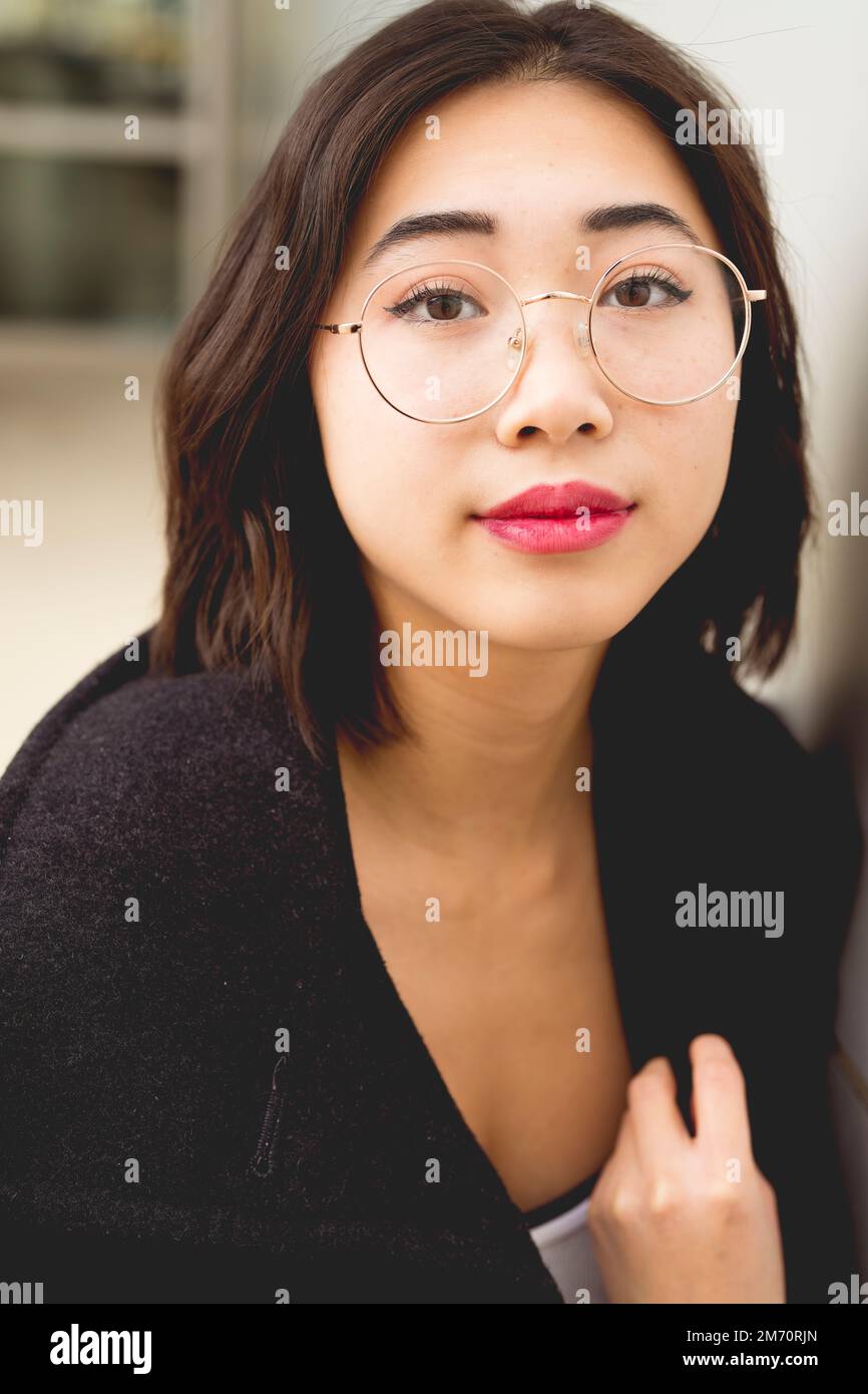 Close Up | Headshot of Beautiful Young Business Woman Leaning Against ...