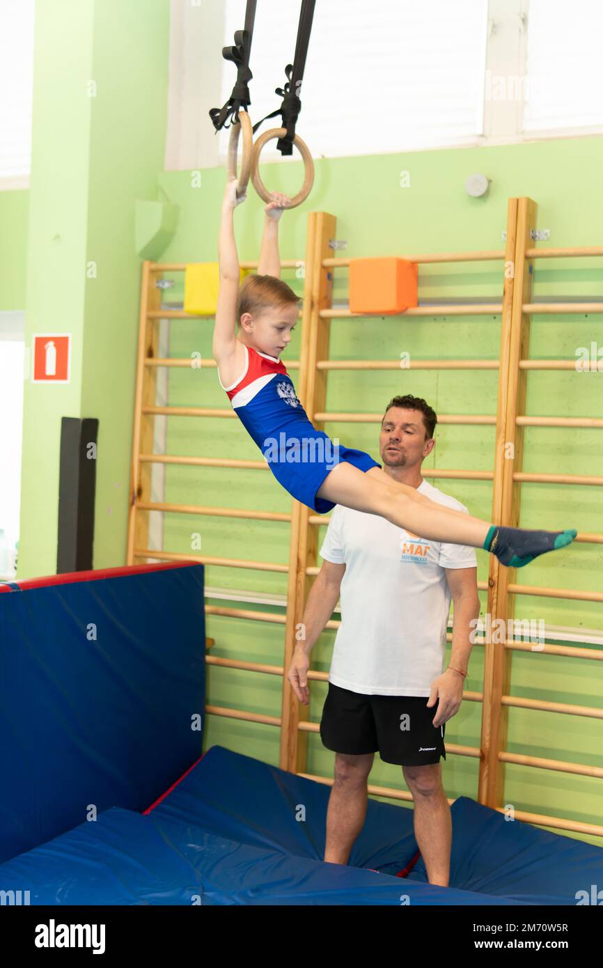 MOSCOW, RUSSIA-DEC 18, 2022: exercise strong ring male athlete health ...