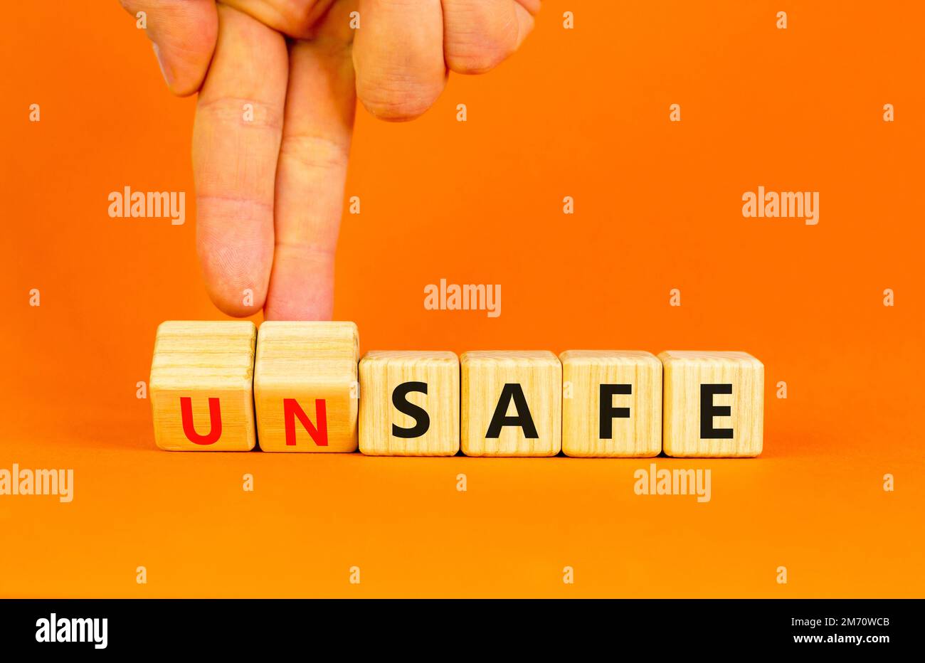 Safe or unsafe symbol. Concept word Safe Unsafe on wooden cubes ...
