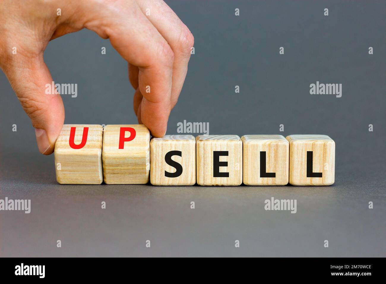 Sell or upsell symbol. Concept word Sell Upsell on wooden cubes ...