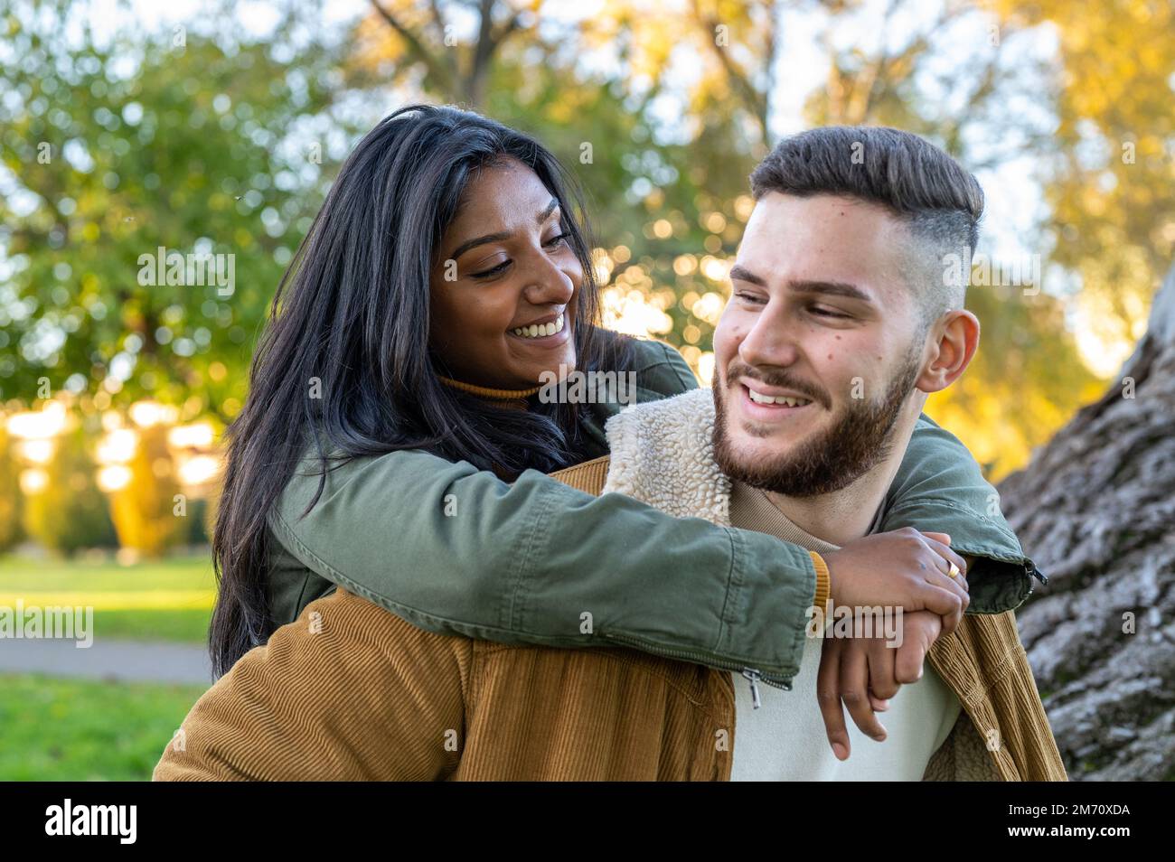 Young couple sharing emotions outside, two people cuddling, be my ...