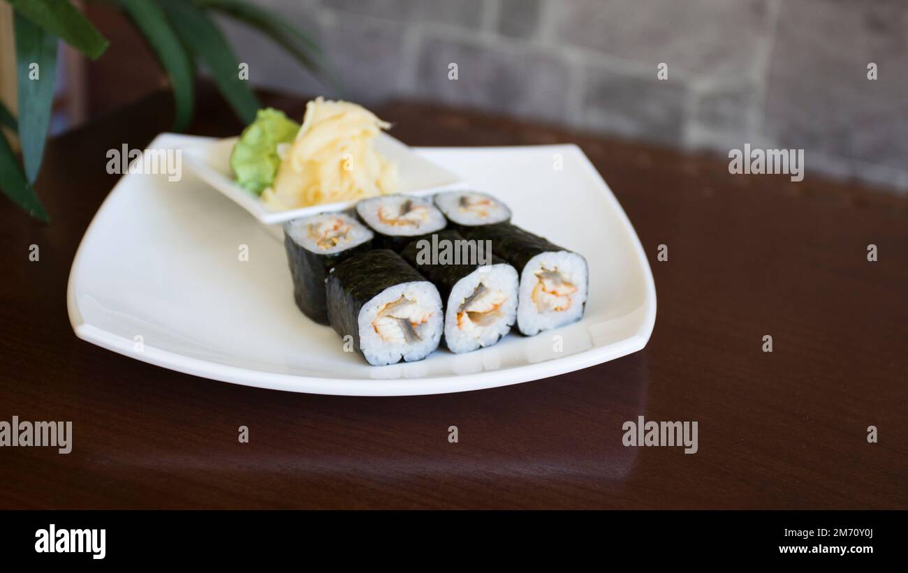 Maki eel. Sushi rice combination with smoked eel fish Stock Photo - Alamy