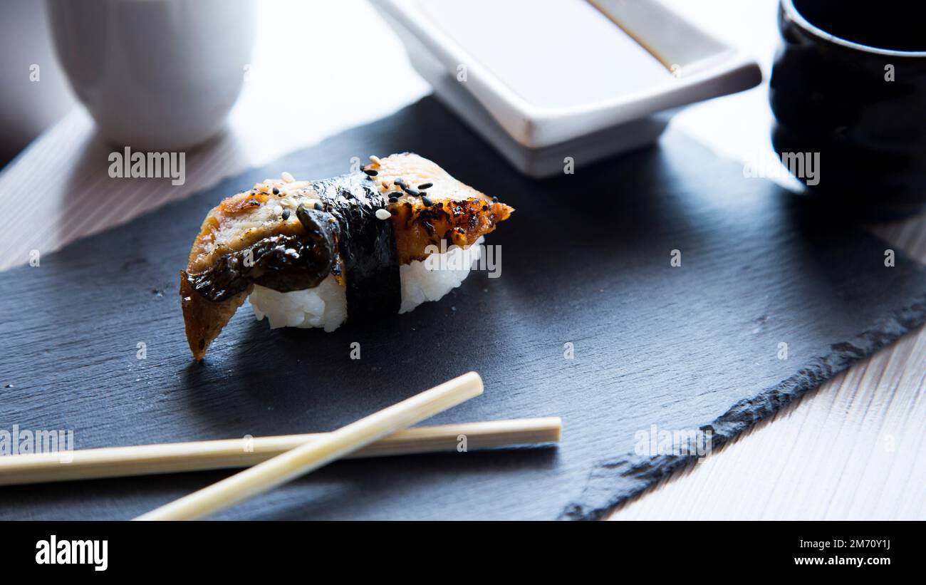 Nigiri eel. Sushi rice combination with smoked eel fish Stock Photo - Alamy