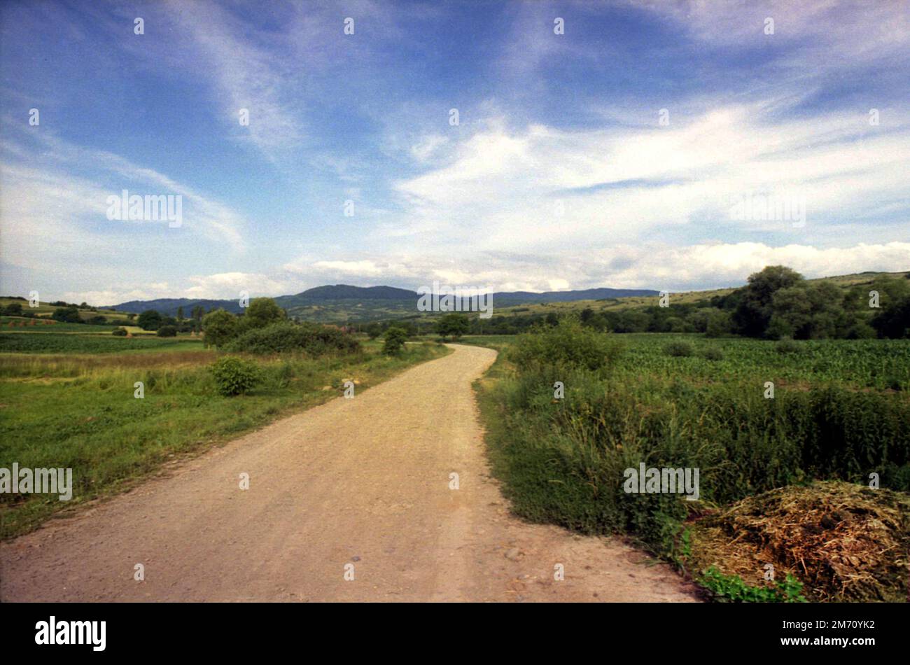 Landscape with dirt road in Mures County, Romania, approx. 2001 Stock ...