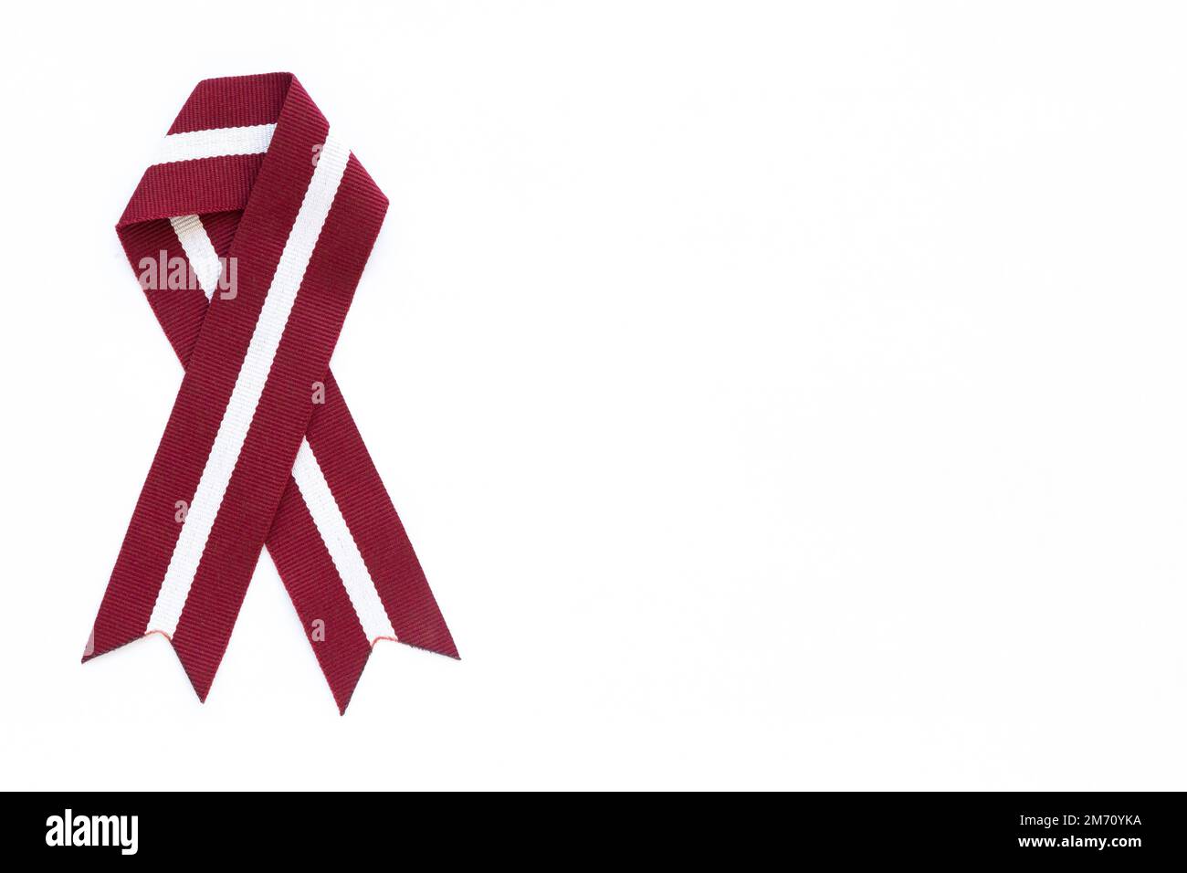 Ribbon in the colours of Latvian flag isolated on a white background Stock Photo - Alamy