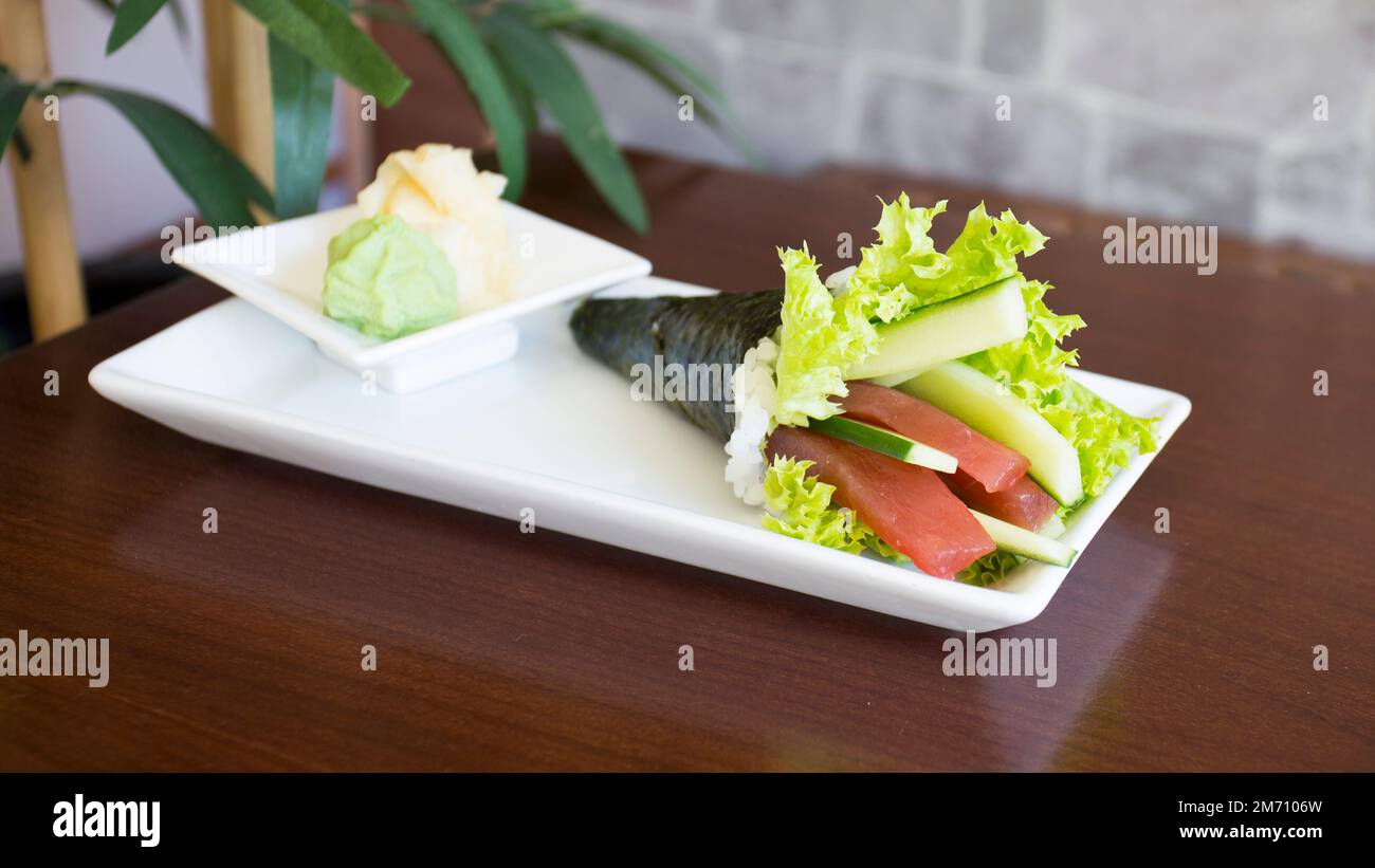 Tuna Temaki. Sushi rice combined with premium tuna fish Stock Photo - Alamy