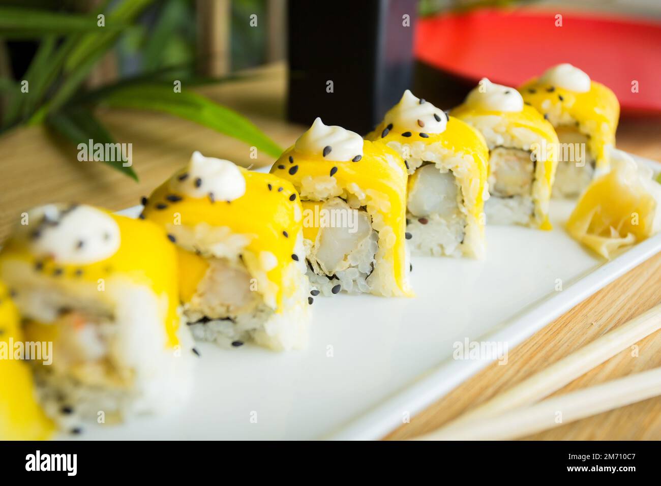 Butterfish Mango Uramaki Sushi. Fine sushi rice combined with white ...