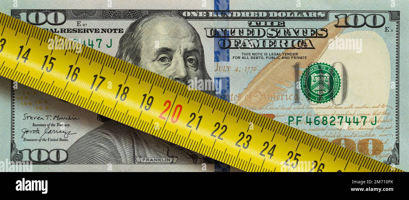 100 dollar banknote with yellow ruller for design purpose Stock Photo ...