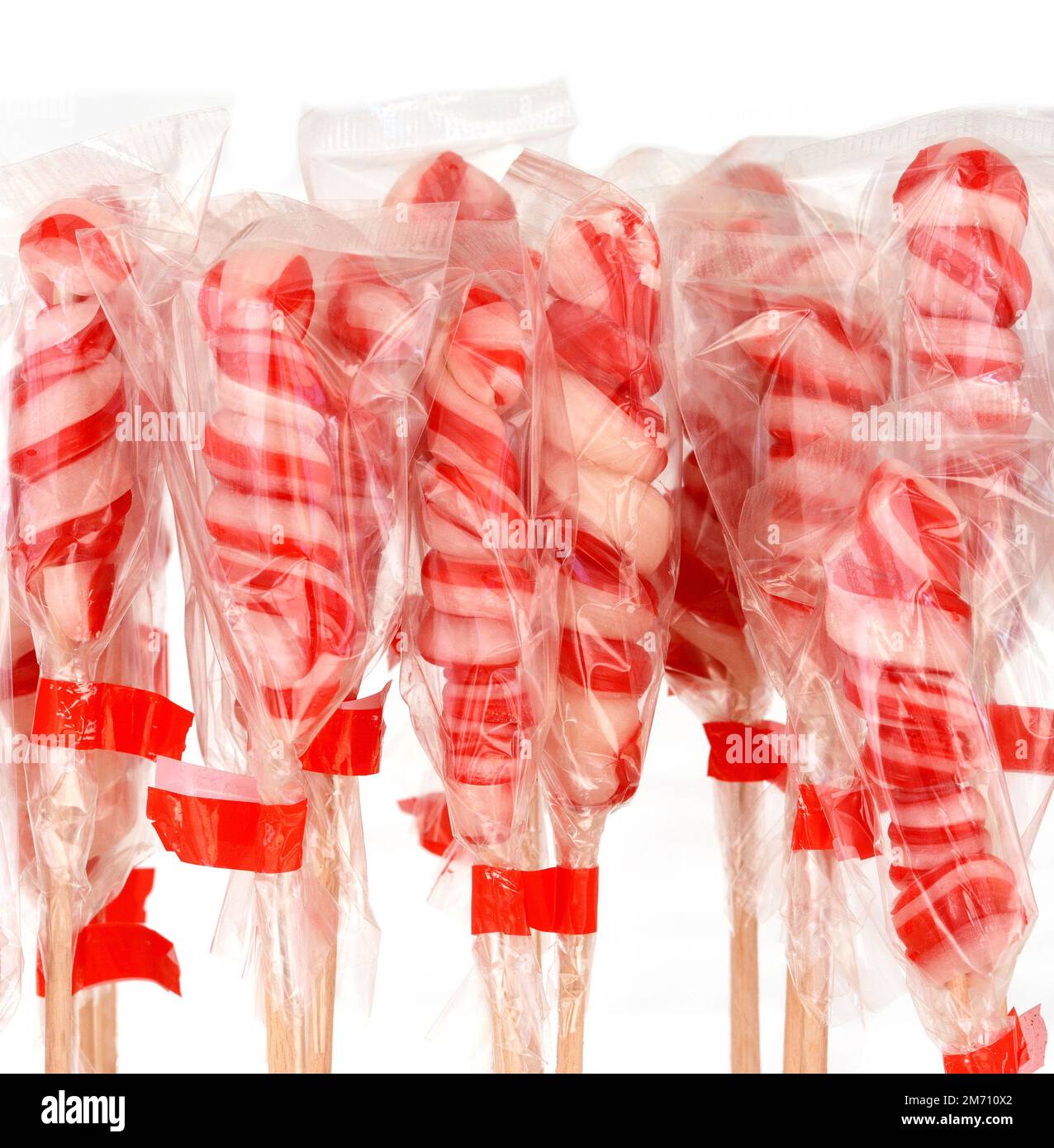 Lollipop background. Colorful lolly pops wrapped in cellophane Stock ...