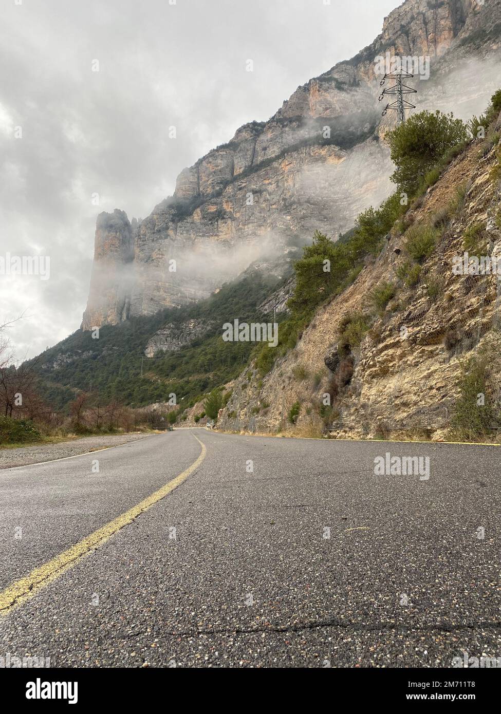 An empty road on the side of a rocky moountain in Andorra Stock Photo ...