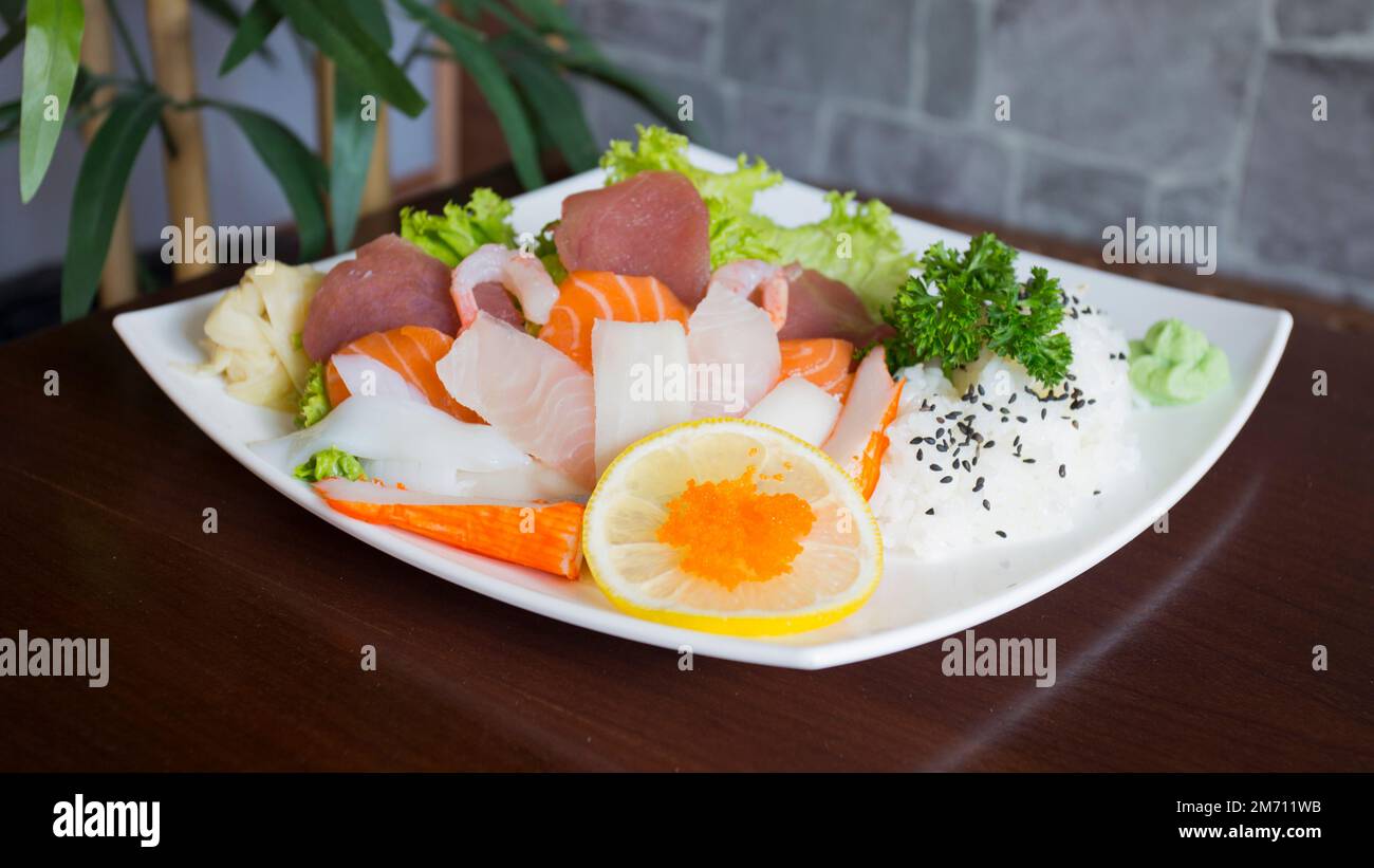 Sashimi Sushii Set with different kinds of fish like tuna and salmon ...