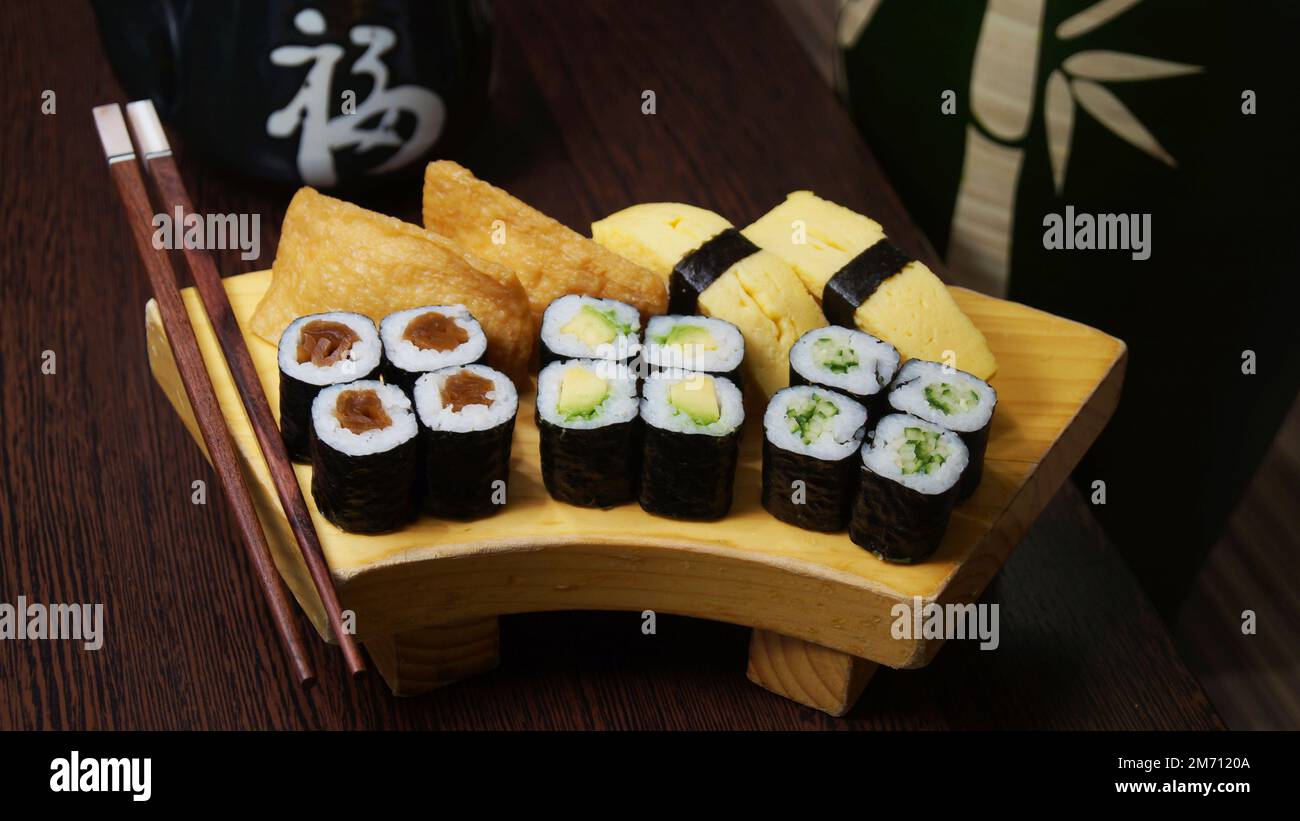 Set of sushi with variety of makis, nigiris and sashimi with fine fish ...