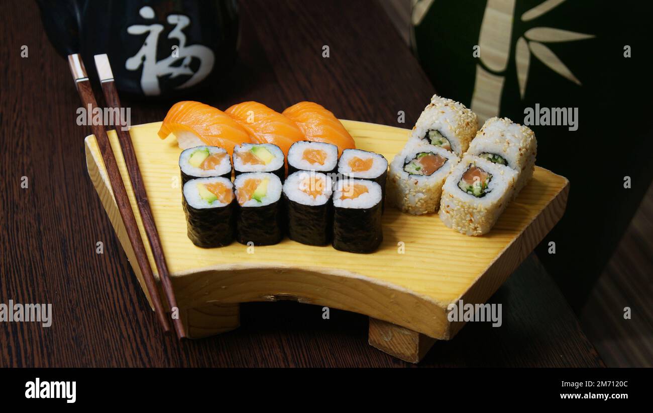 Set of sushi with variety of makis, nigiris and sashimi with fine fish ...