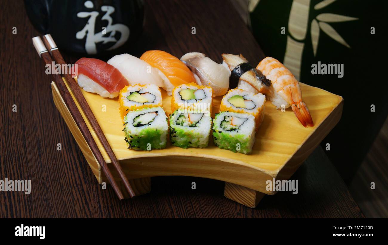 Set of sushi with variety of makis, nigiris and sashimi with fine fish ...